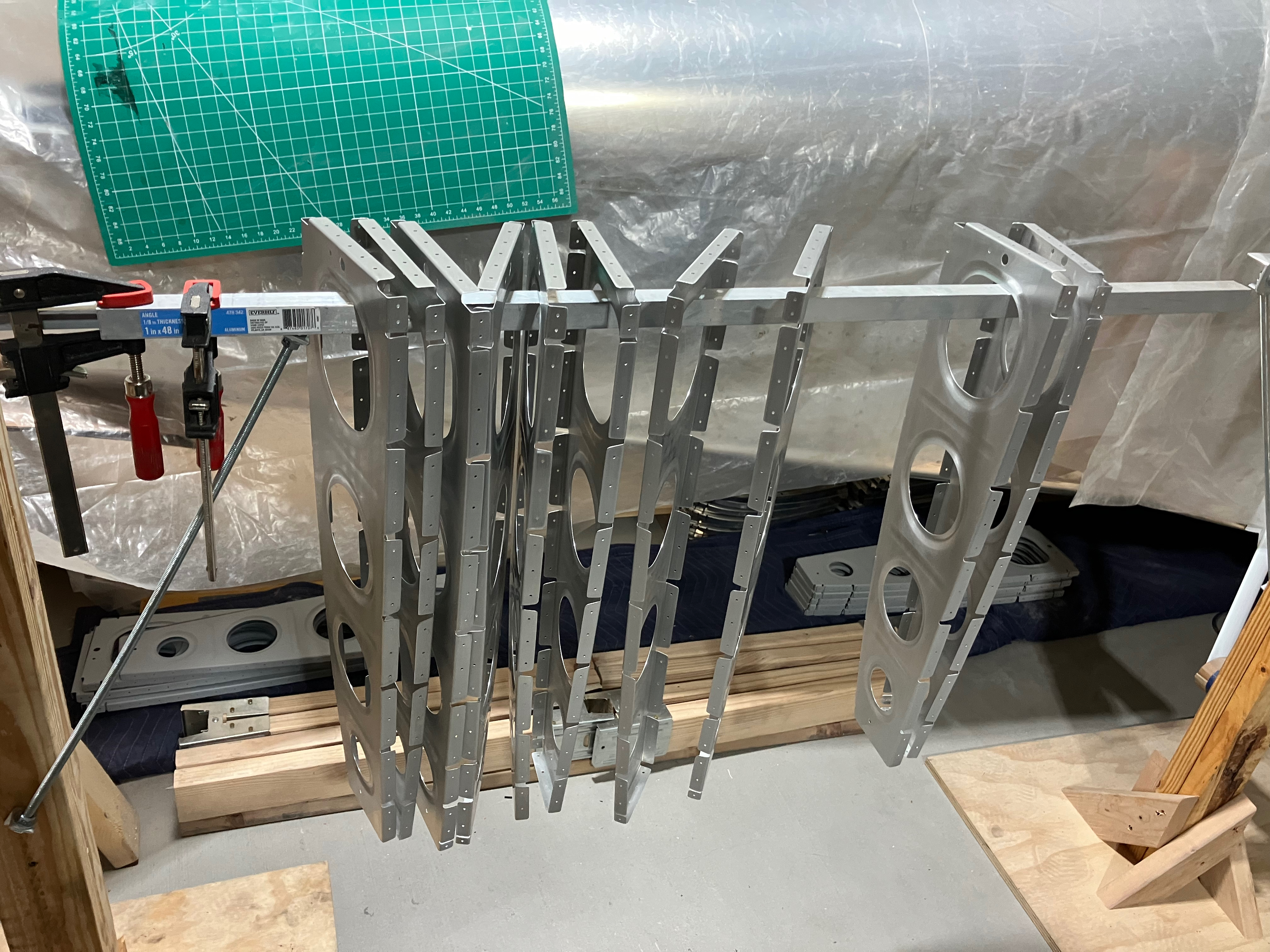 Priming more ribs and drilling the aileron spars